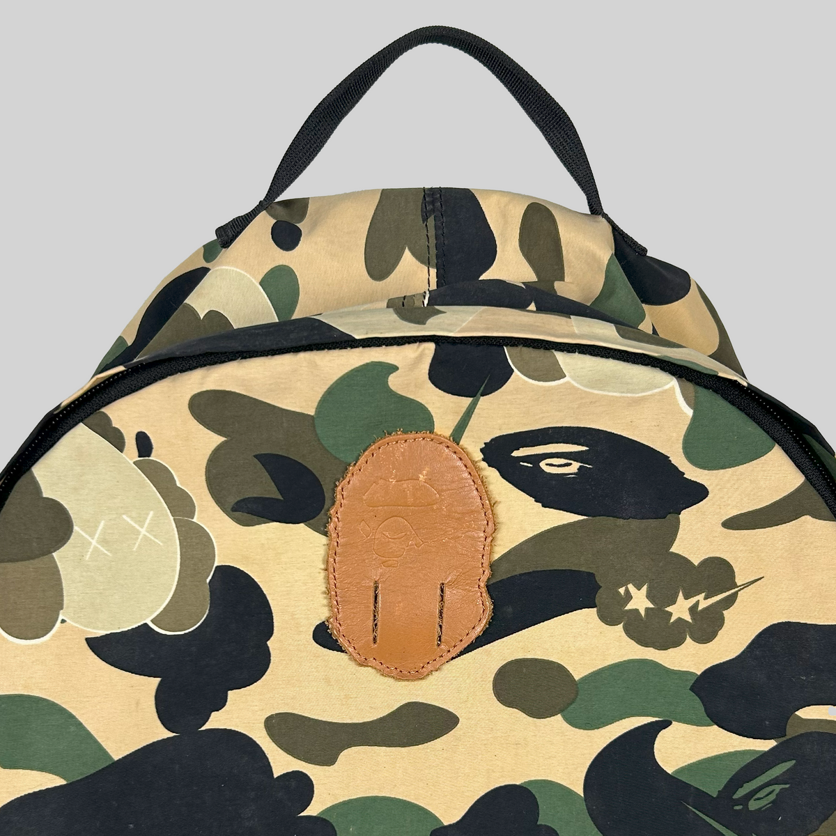 Kaws Bendy Camo Backpack – Azucar's Favorite Shop
